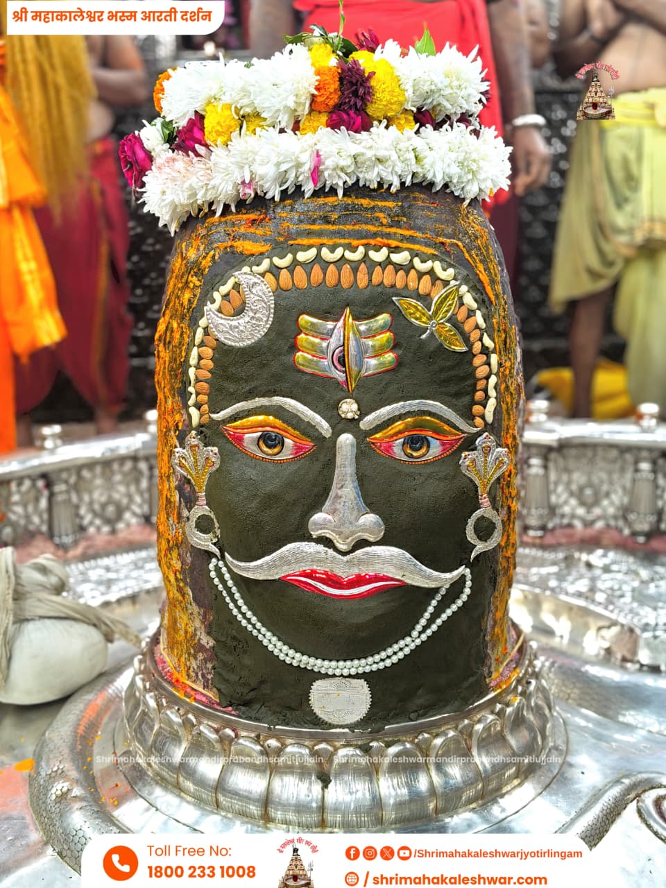 Baba Mahakal's kingly appearance was adorned by offering silver Tripund ...