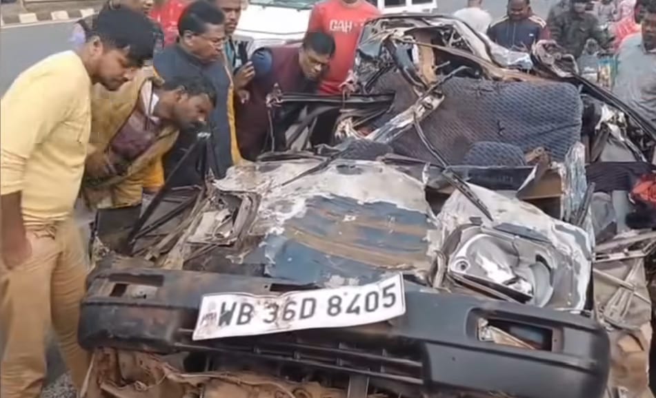A truck collided with a van and pushed it under a government bus parked ...