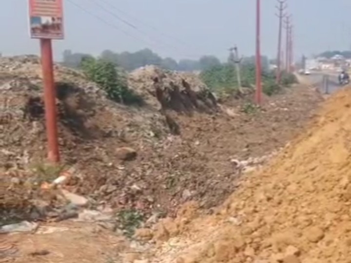 Construction of road track on garbage heap in Gosaiganj
