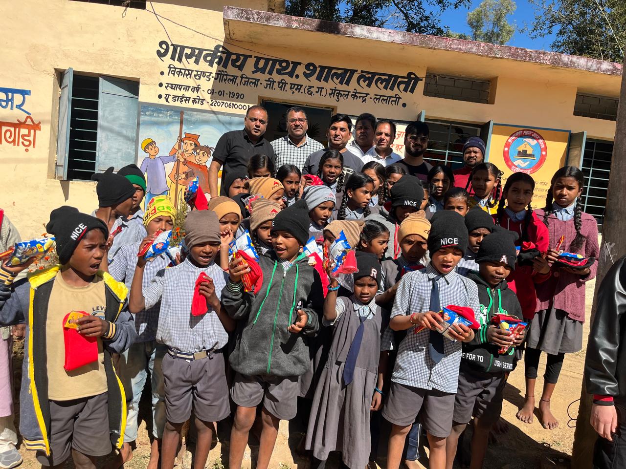Sweaters and caps were distributed to the children of Primary School ...
