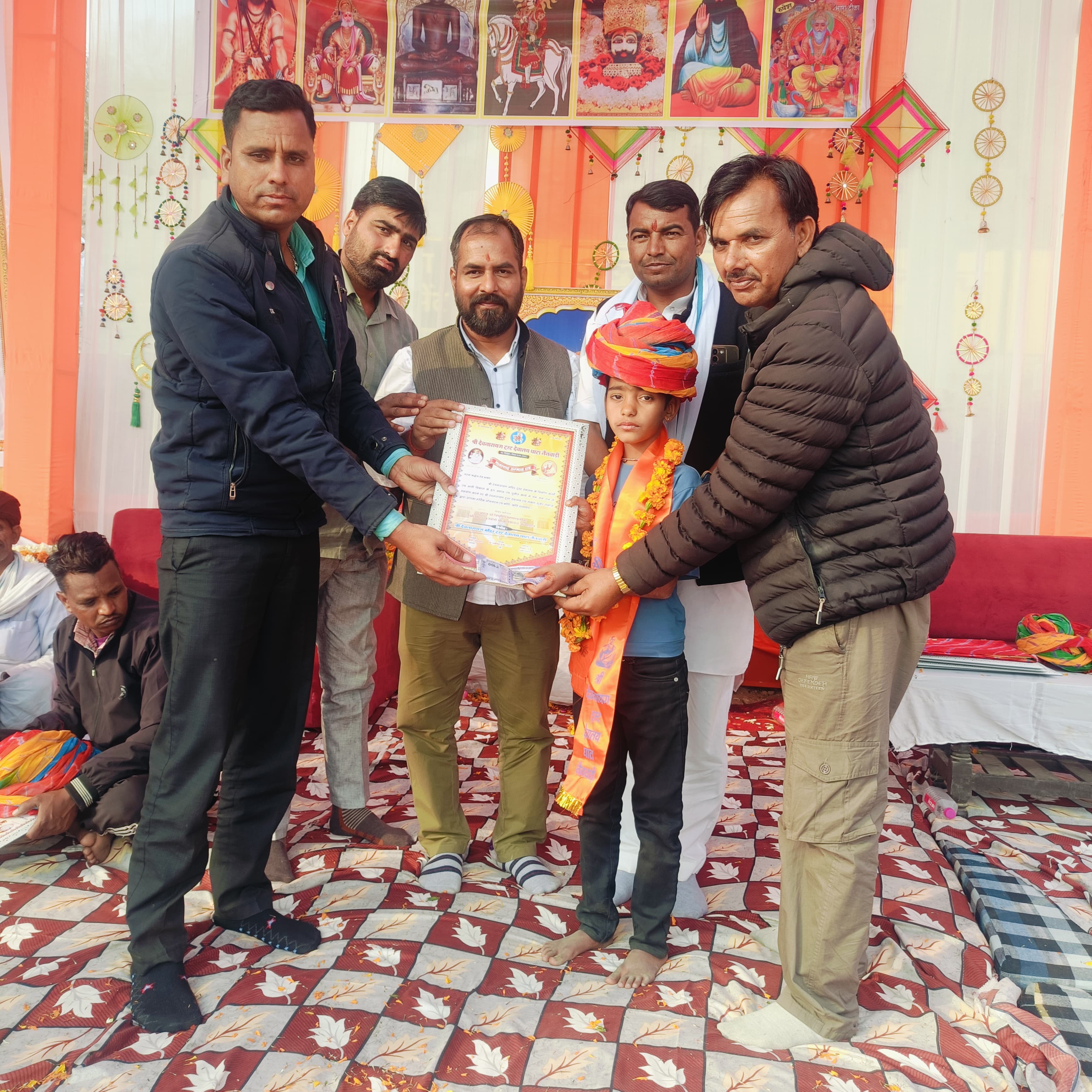 Sona Bai of Udgaon was honored for her poem on Devnarayan ji.