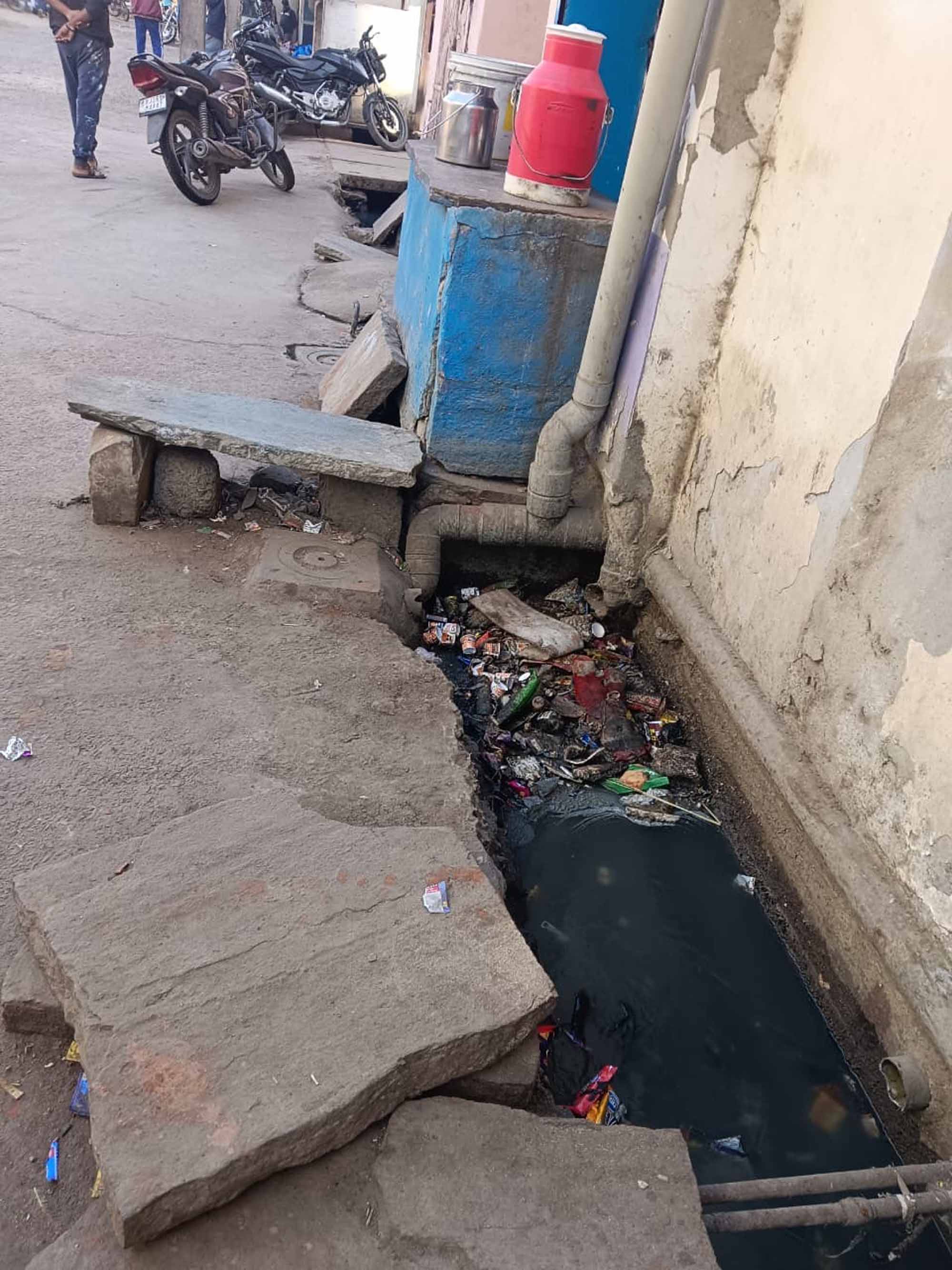 The entire area is littered with garbage-clogged drains and a ...