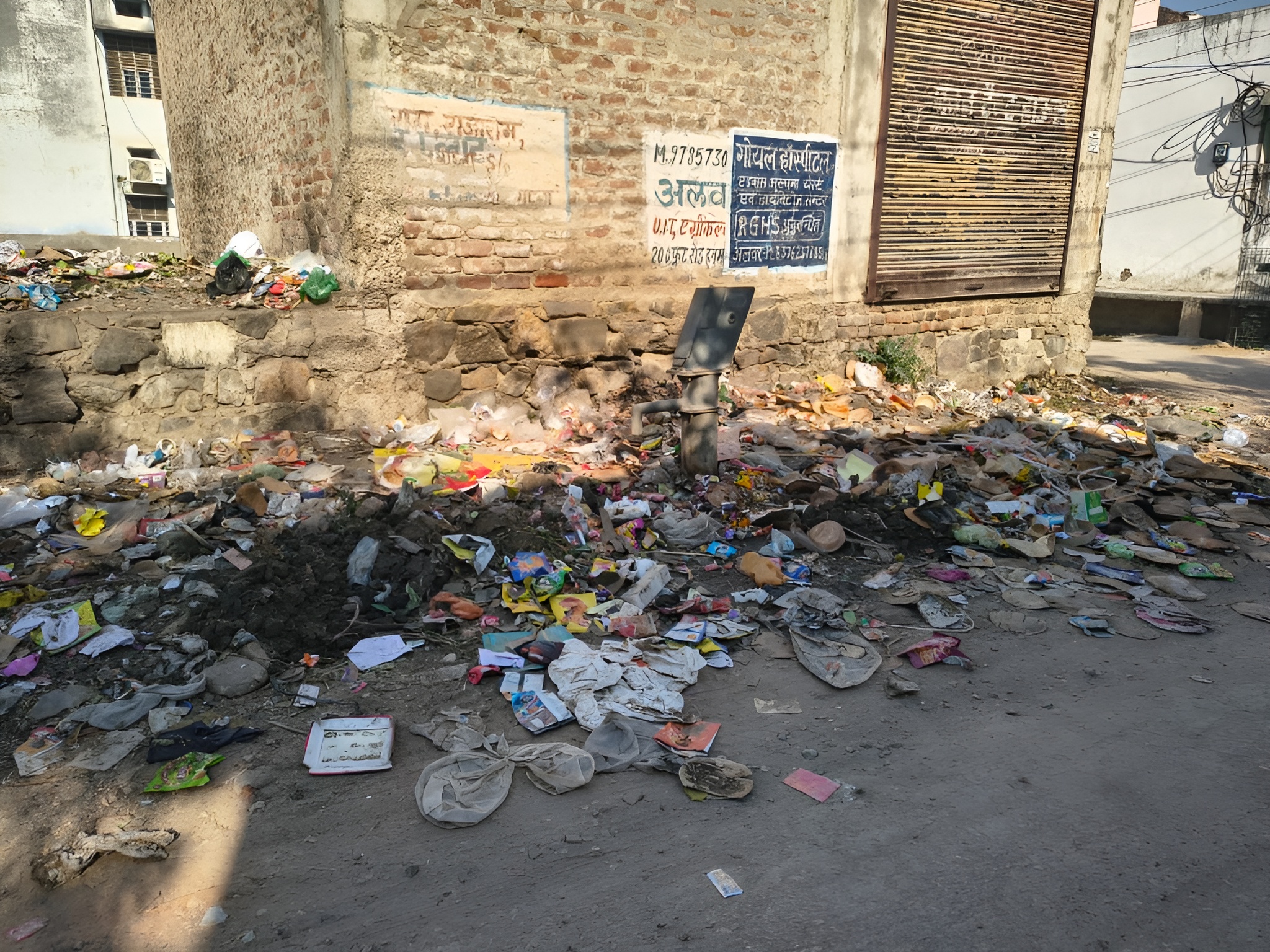 People are throwing garbage openly on the road in front of the Shiva ...
