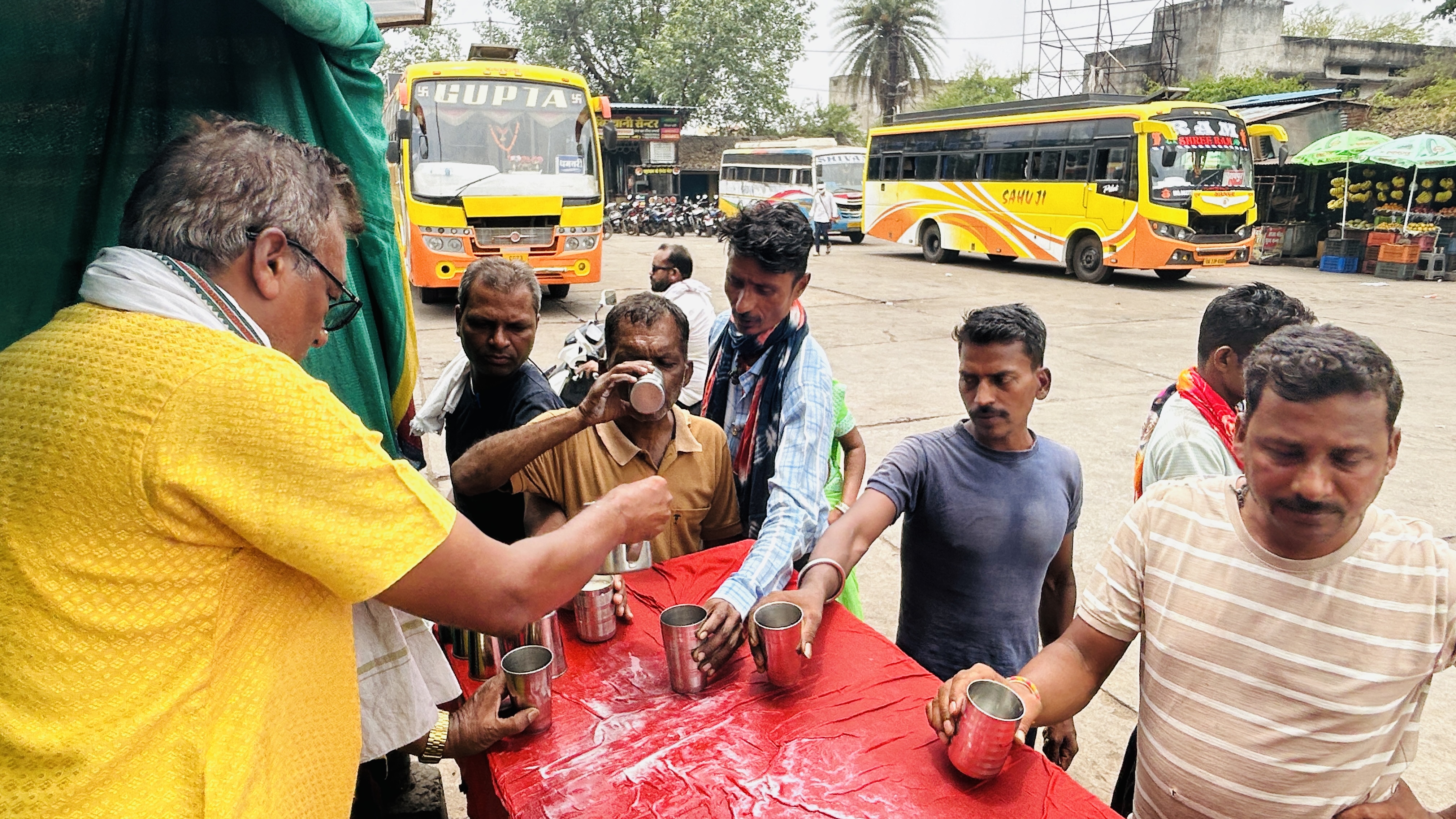 300 liters of buttermilk is being distributed daily at the bus stand ...