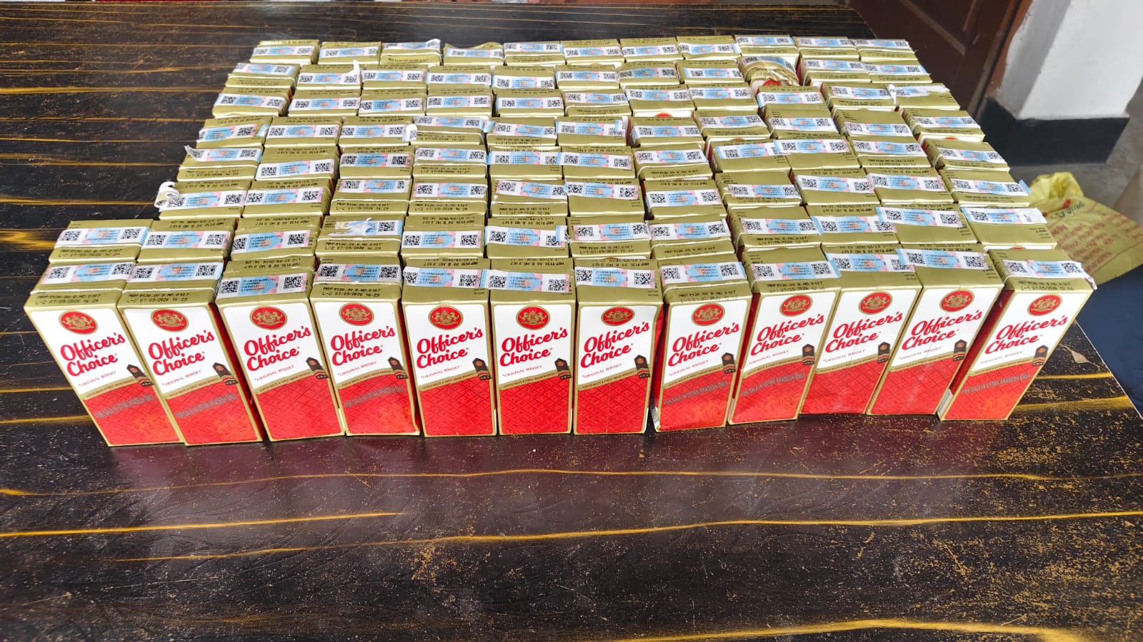 1,097 cartons of foreign liquor seized from two trucks, both drivers ...