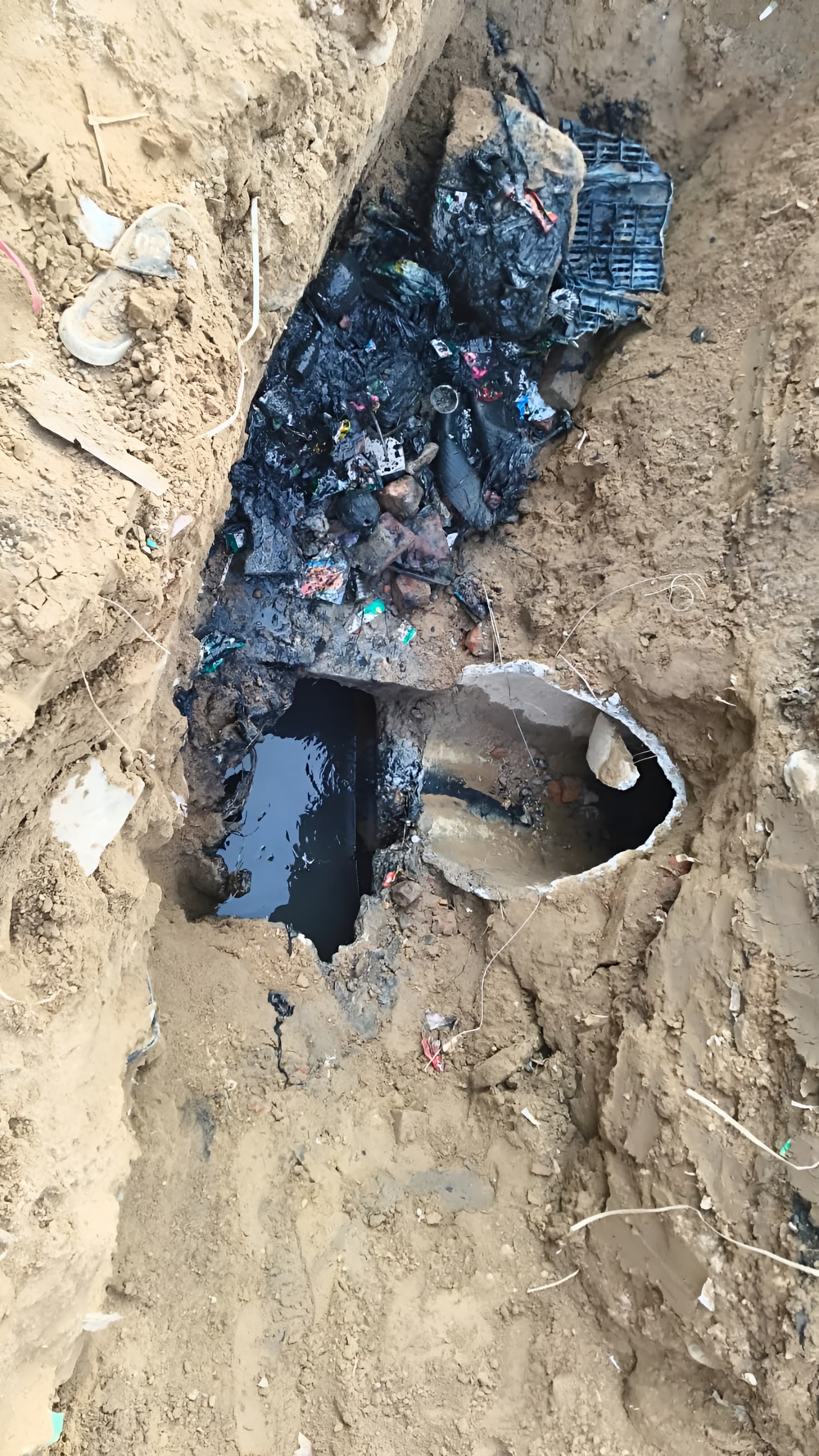 Sewer line tampered with in Basai, dirty water spread on the road