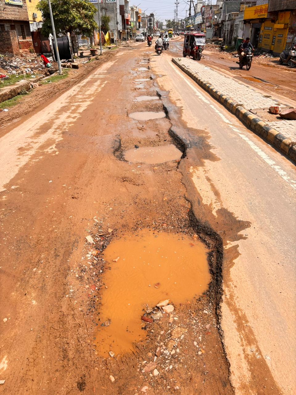 Both sides of the road have been damaged for four months, causing ...