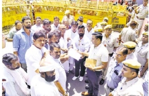 The sanitation workers reached the Collectorate holding placards and ...