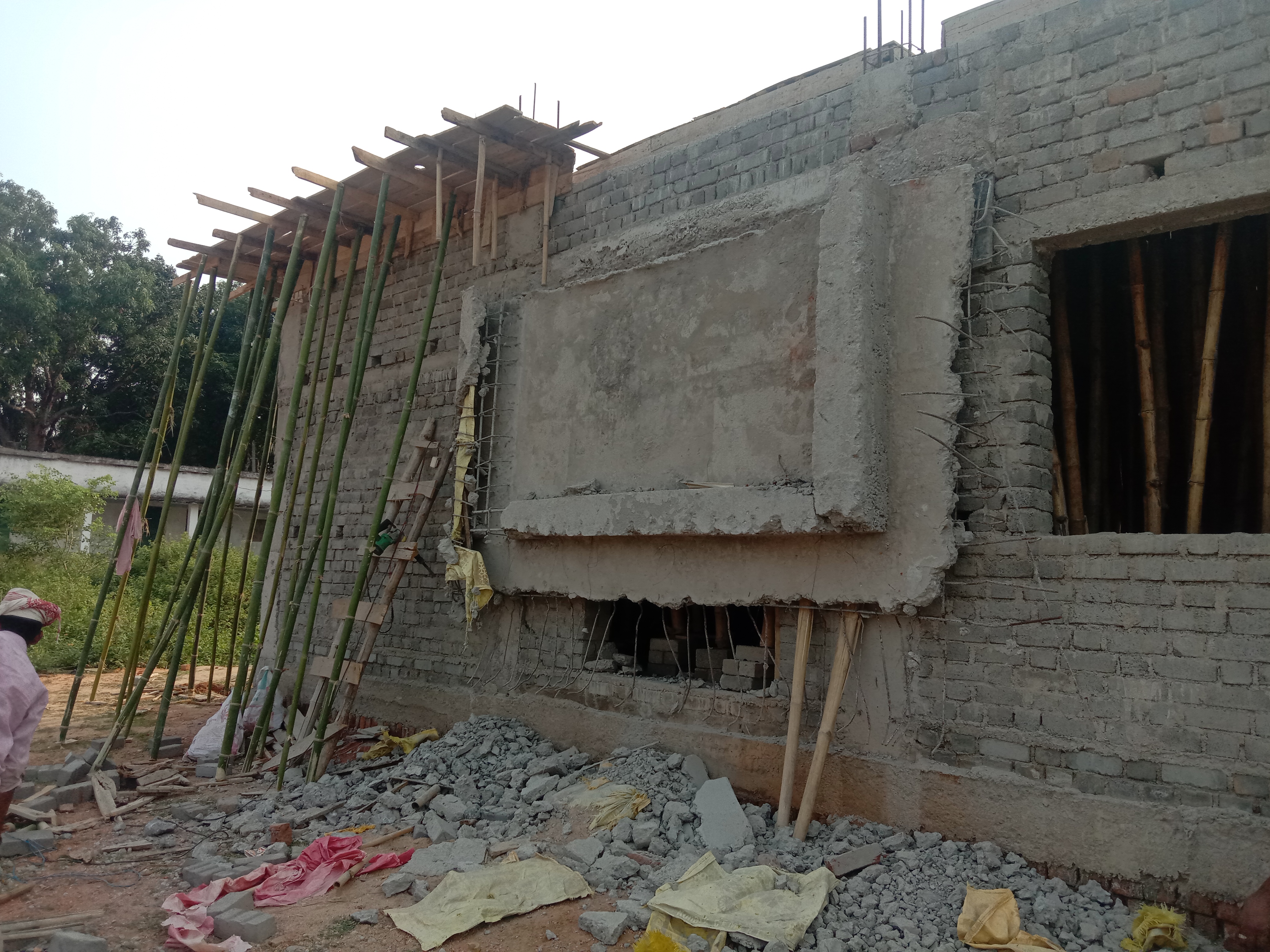 Portico collapses during health center construction, workers have ...