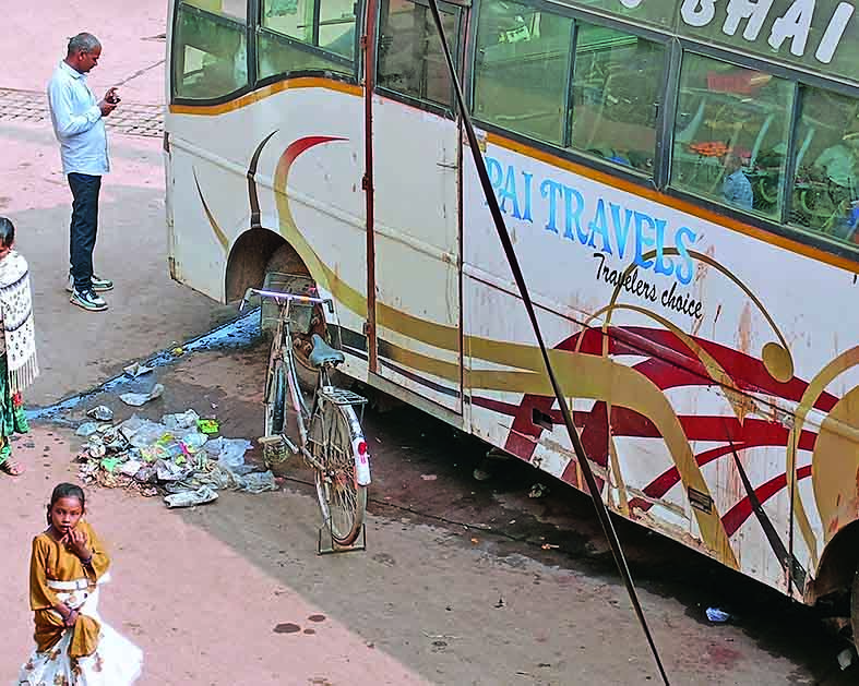 Garbage is scattered at the old bus stand.