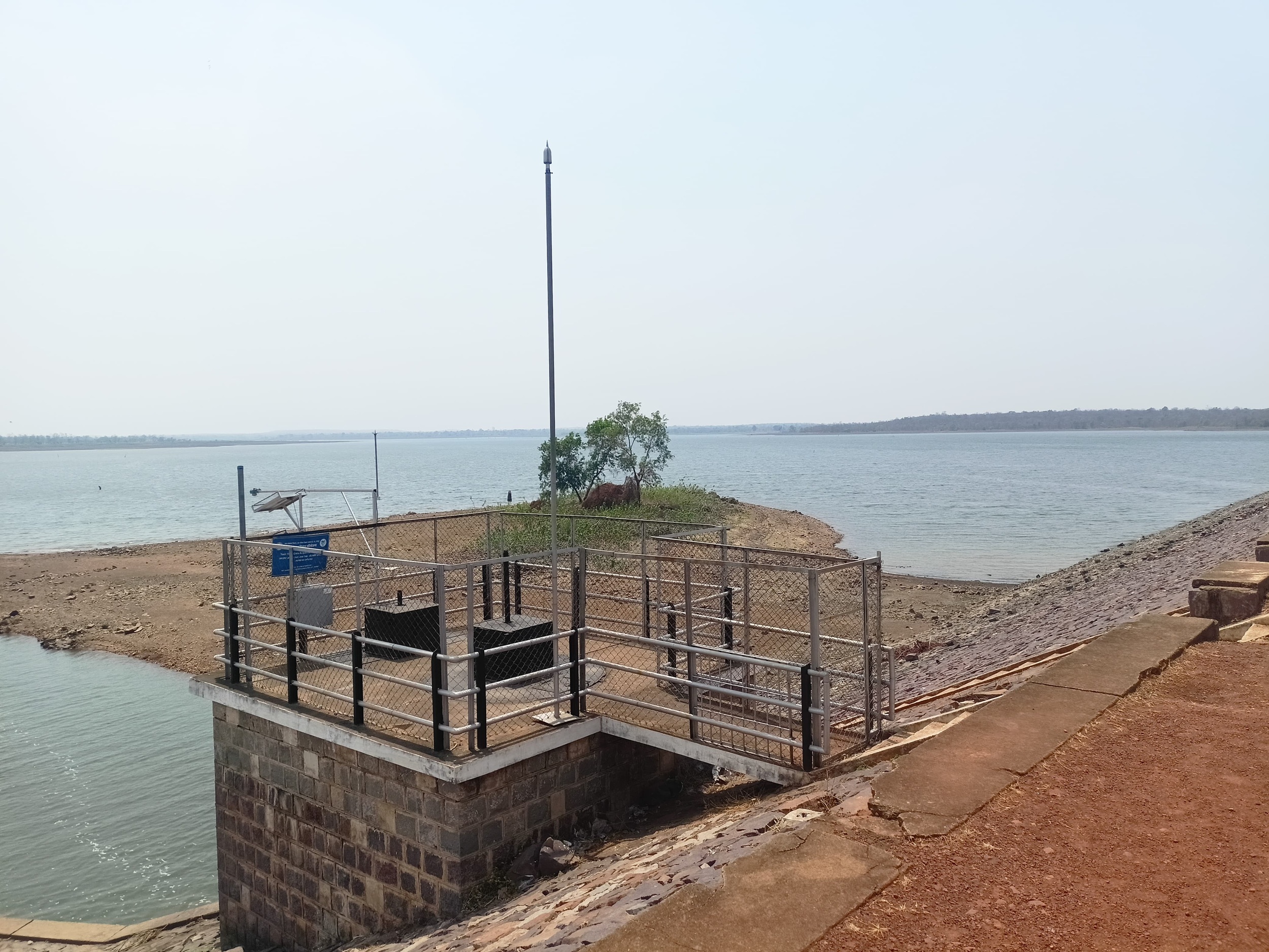Due to evaporation, the water level of four dams decreases by 0.30 feet ...