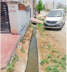 Silt clogged drain in Rudra Vihar, Keshav Nagar