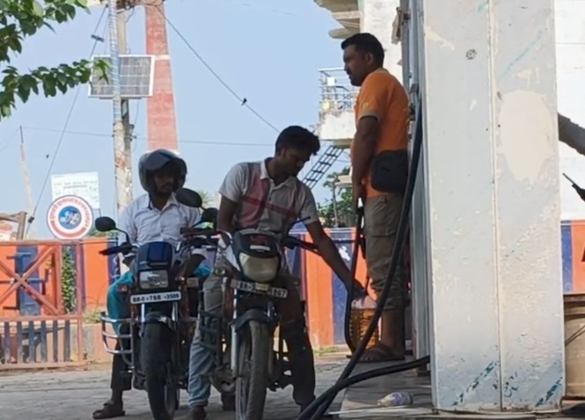 Despite the ban, pump operators are selling petrol in bottles.