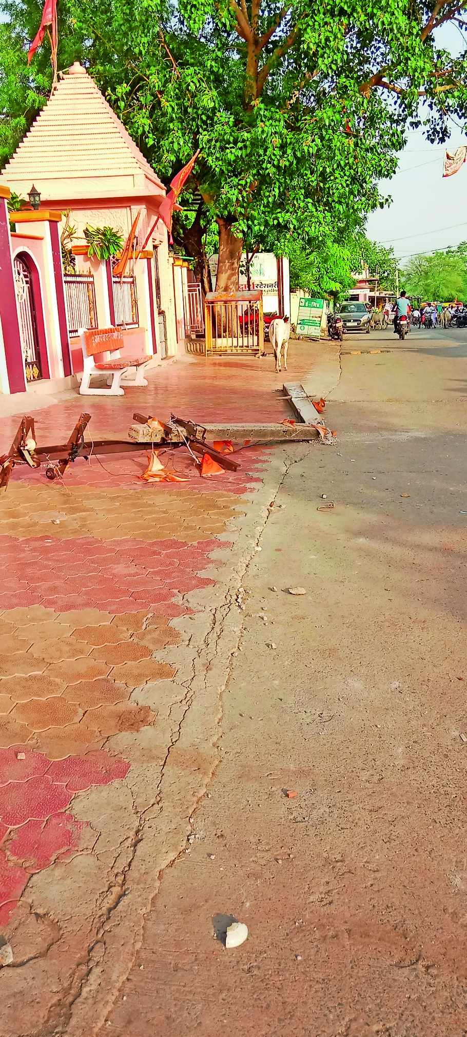 Electricity pole collapses in front of Pagaria temple