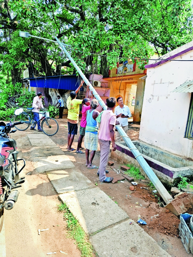 Light pole damaged after being hit by a truck