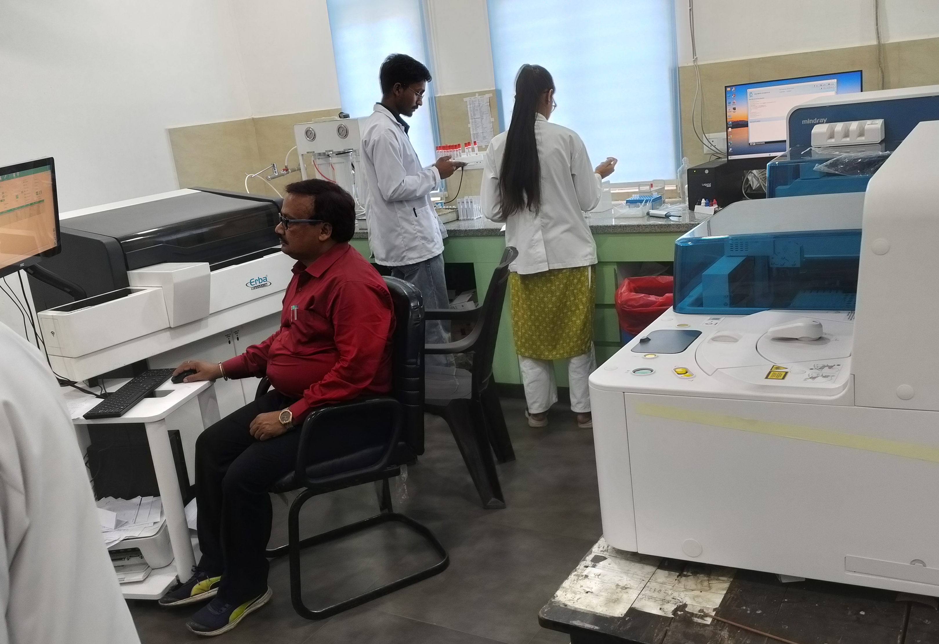 In the lab, the report is being prepared by the ward boy and not the ...