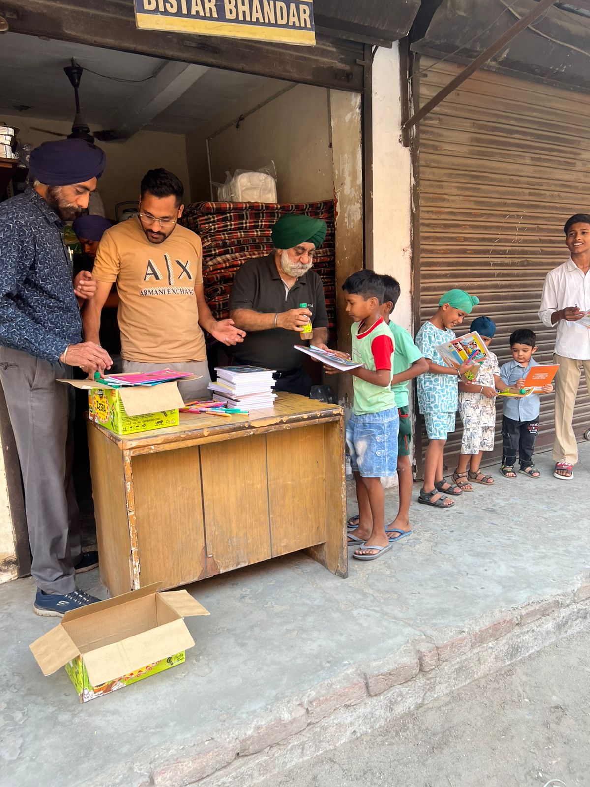 Distributed stationery to needy children