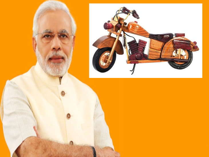 Auction of PM Modi's wooden bike for 5 lack rupees | पंतप्रधान नरेंद्र ...