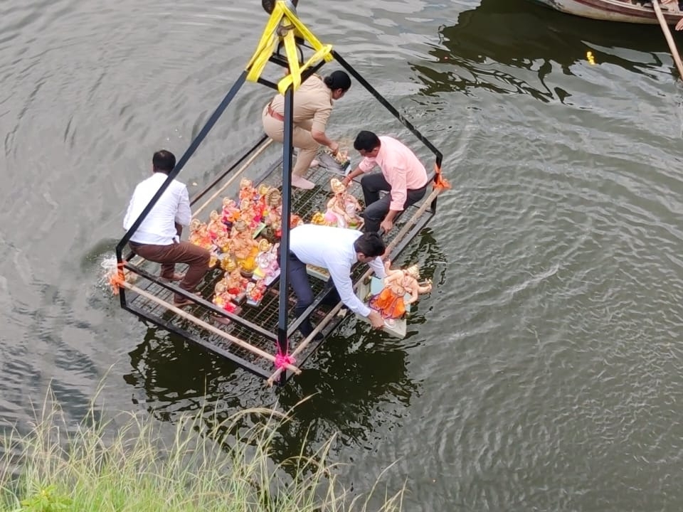 Many 3-foot idols of Lord Ganesha duly immersed in the stone quarry ...