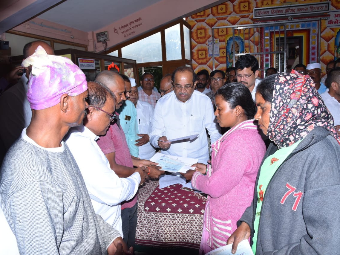 A check of Rs.4 lakh each was handed over in the presence of ...