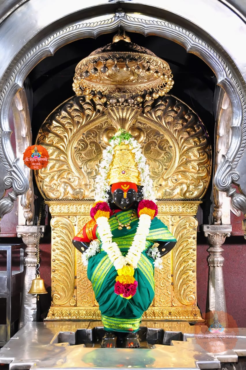 Vitthal-Rukmini temple in Pandharpur decorated with marigold flower ...