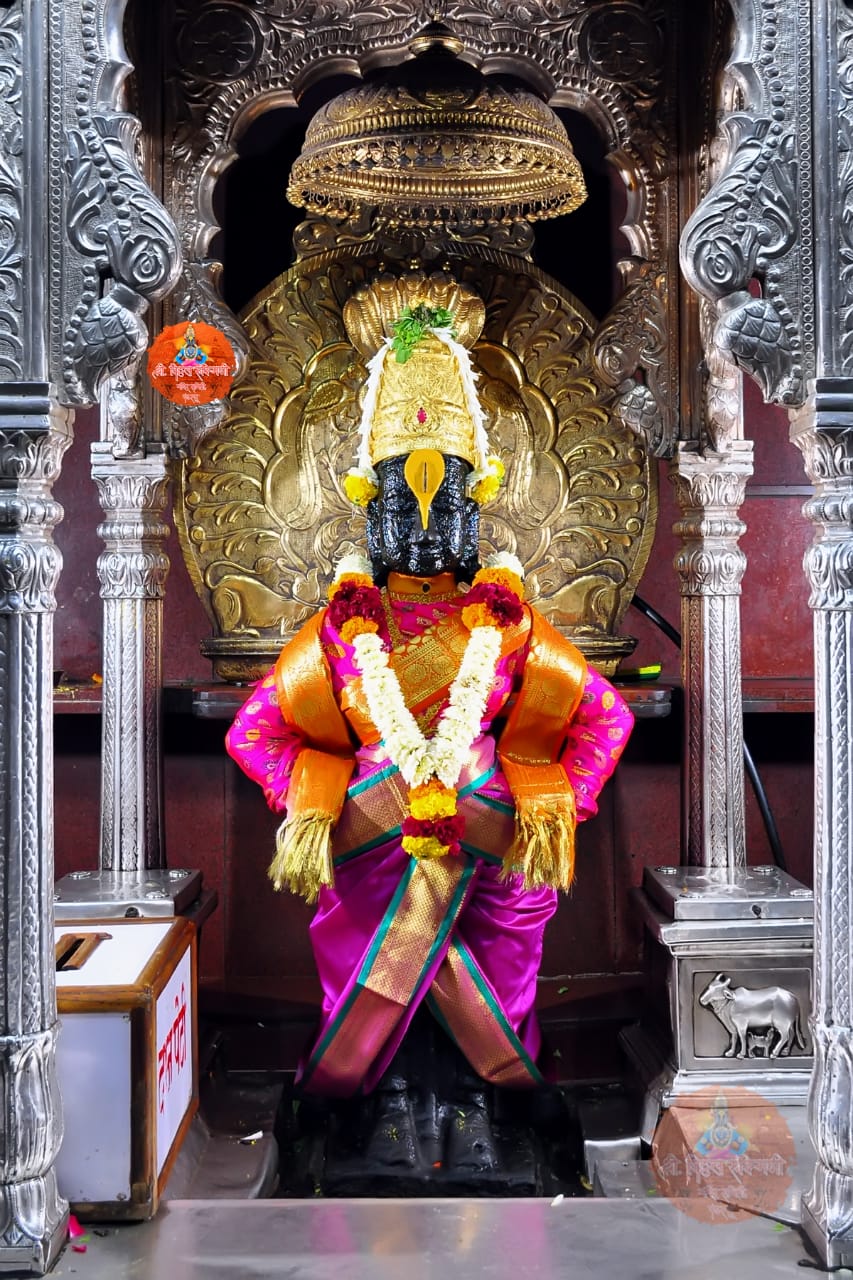 Vitthal-Rukmini temple in Pandharpur decorated with marigold flower ...
