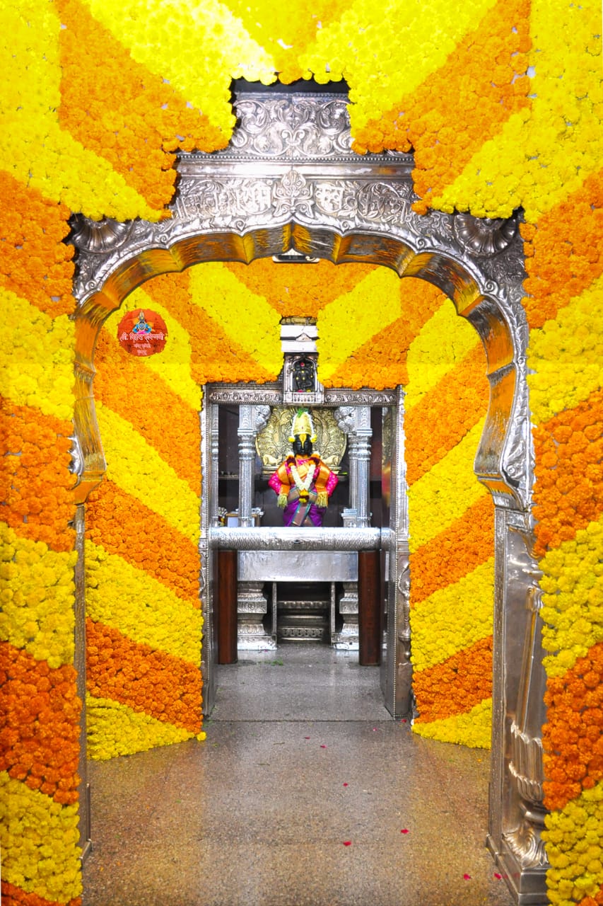 Vitthal-Rukmini temple in Pandharpur decorated with marigold flower ...