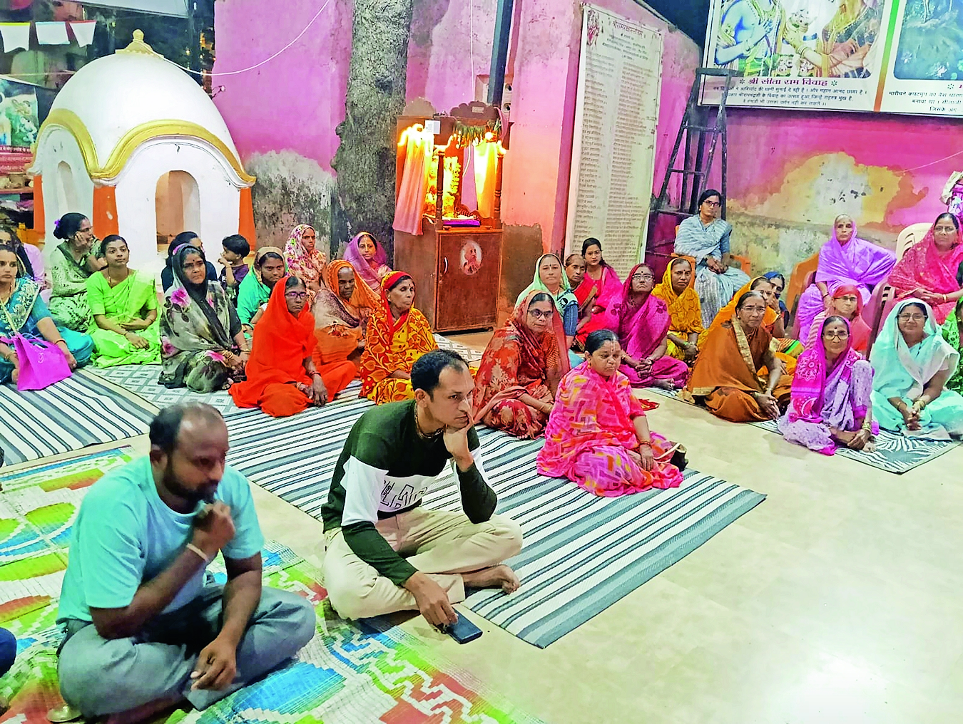 Worship of Radha and Sham Kunda along with Govardhan Mountain; Reading ...