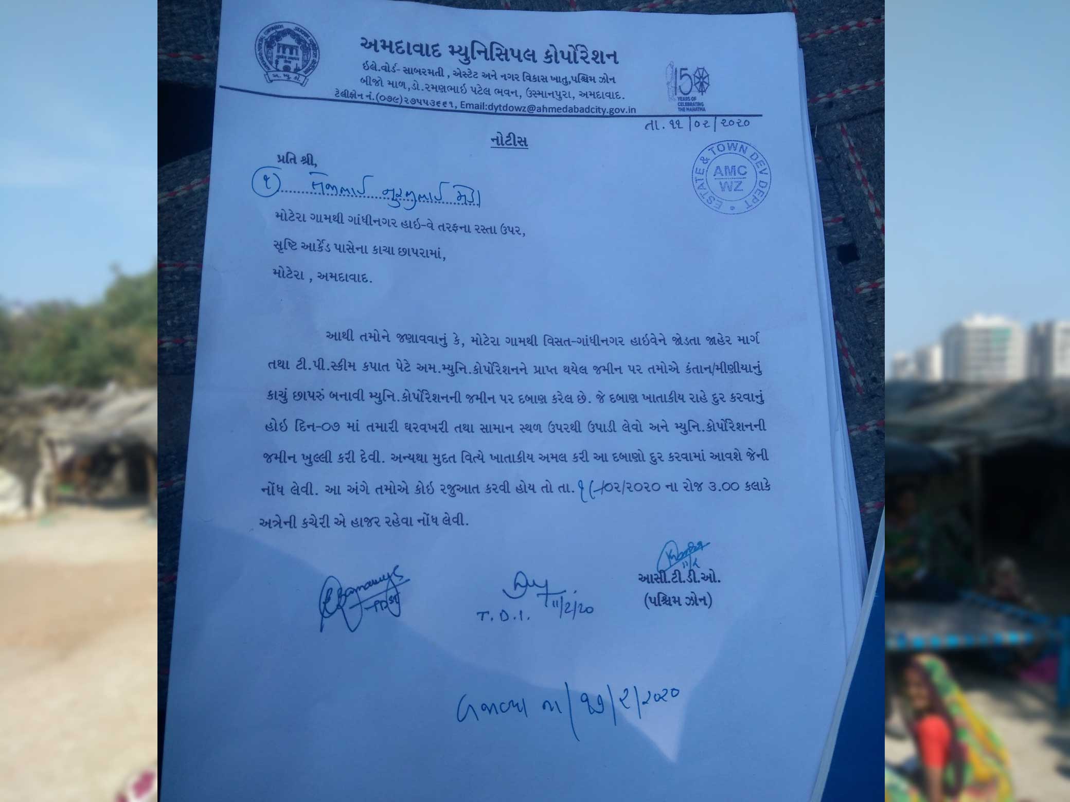 amc has served eviction notice to slum-dwellers living in motera ...