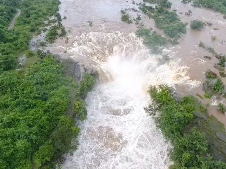 Jamjir Falls in the middle of the forest in Gir, a large amount of ...