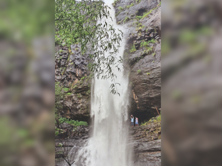 A waterfall falling from a 300 feet high mountain at Anjankund village ...
