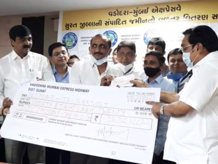42 crore checks distributed to farmers for land acquisition in Surat ...