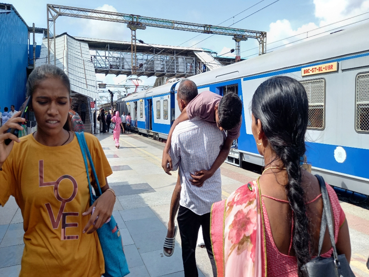 To reach the platform from the new ticket window of Valsad station ...
