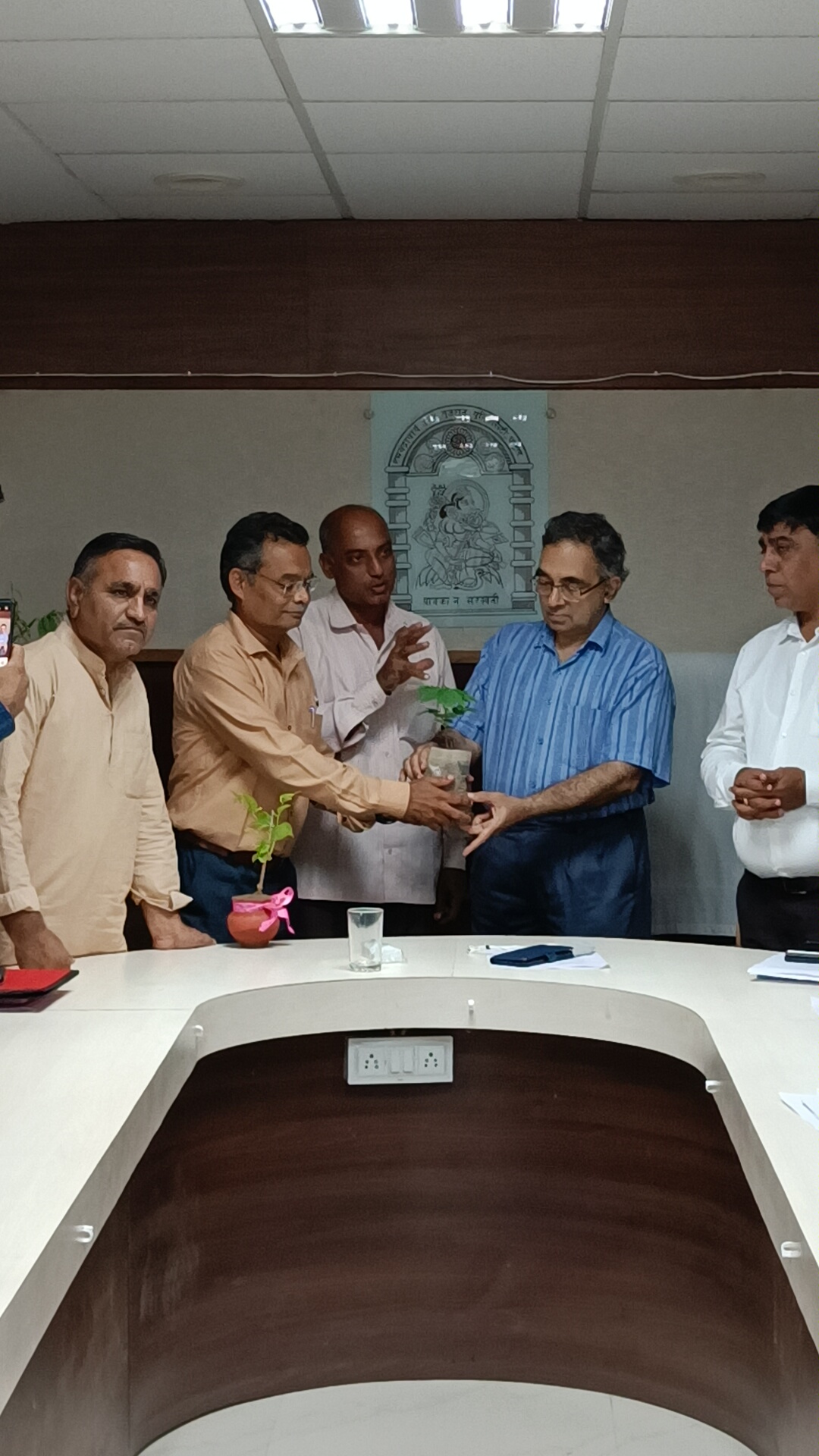 MoU between Hemchandracharya University, Sadbhavna Trust and Atri ...