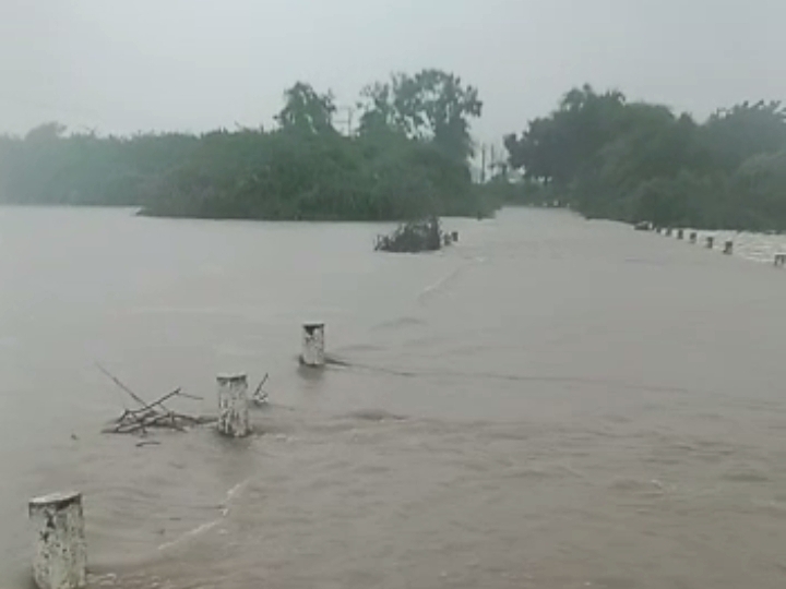 Rupen river overflowed on two banks near Adivada in Becharaji, traffic ...