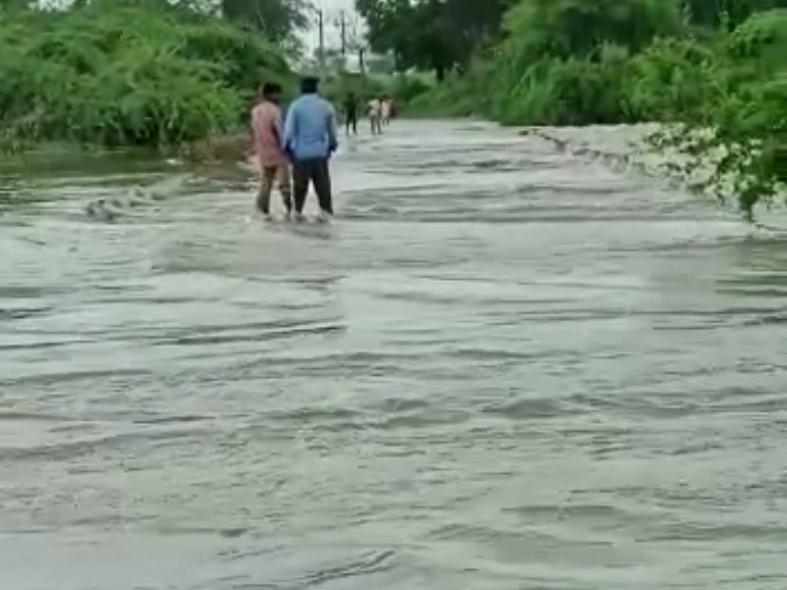 Rupen river overflowed on two banks near Adivada in Becharaji, traffic ...