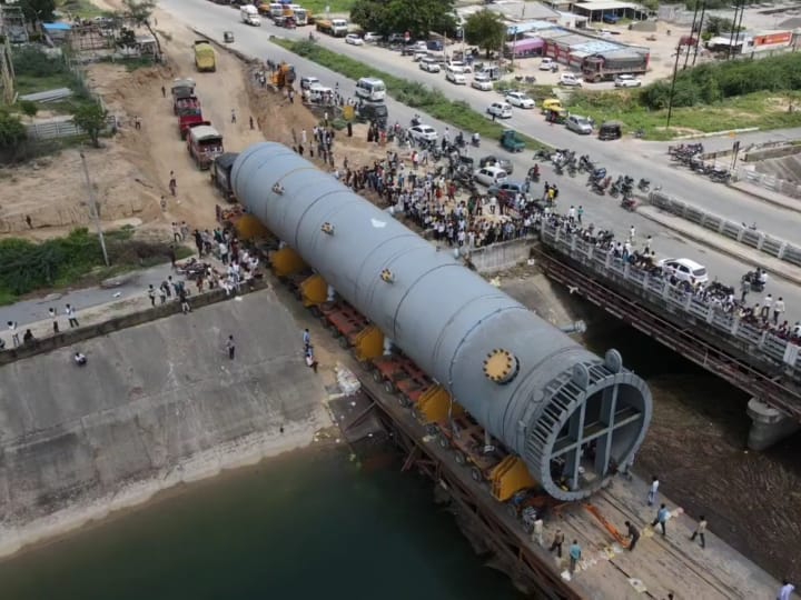 A new bridge was constructed to carry two vehicles of 1906 metric tons ...