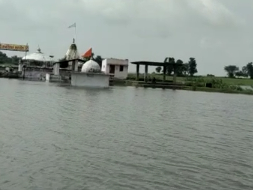 Heavy water flows into the Vatrak river causing the temple to stagnate ...
