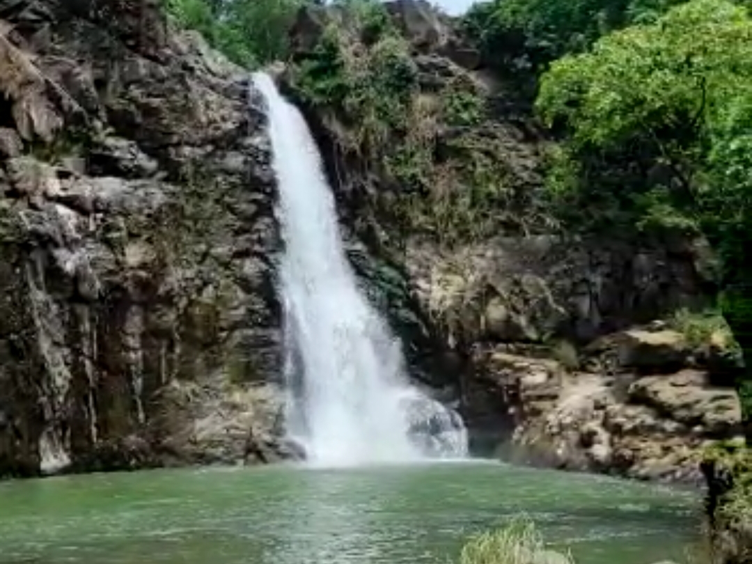The waterfall flowed in the forest area after good rains; People ...