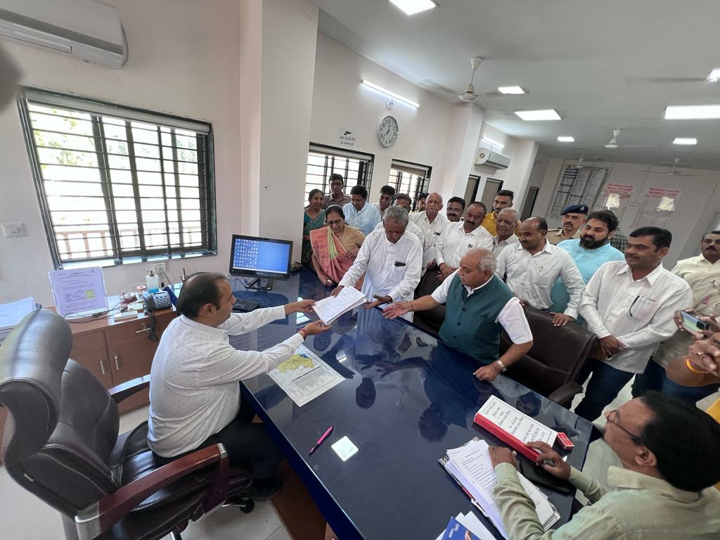 BJP repeat candidate Karshan Solanki fills form in Kadi, holds massive ...