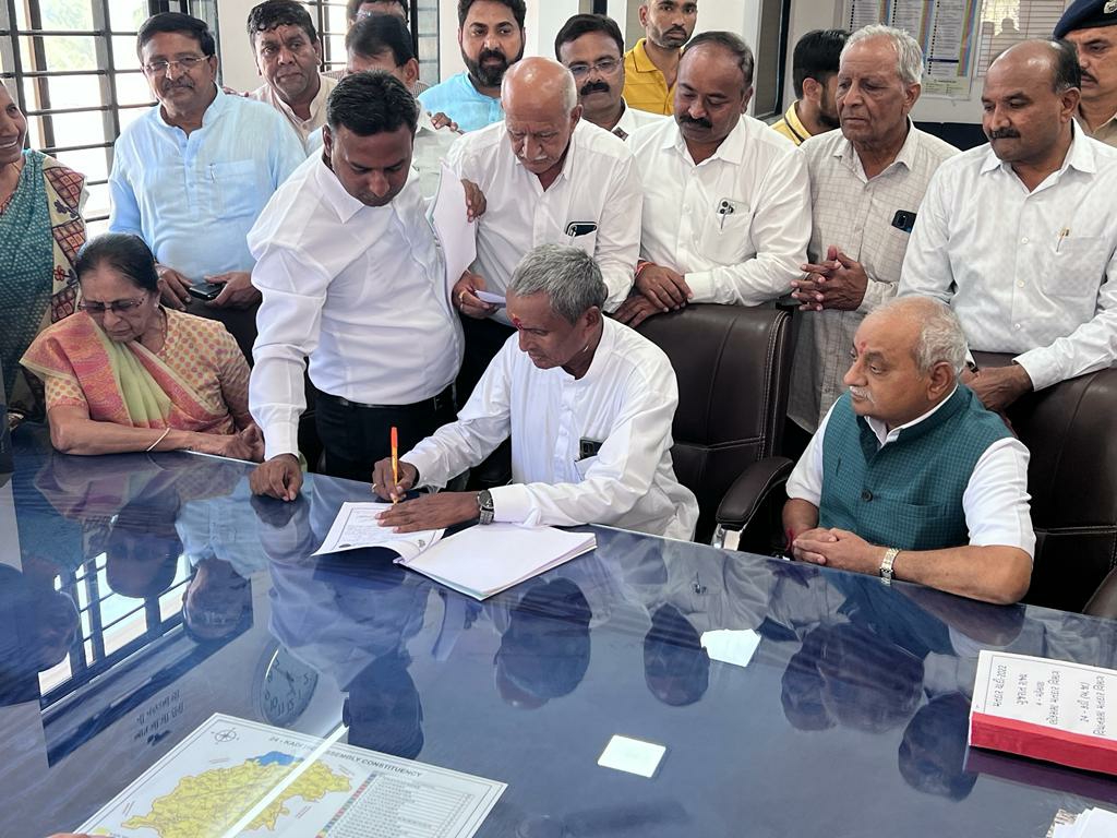 BJP repeat candidate Karshan Solanki fills form in Kadi, holds massive ...