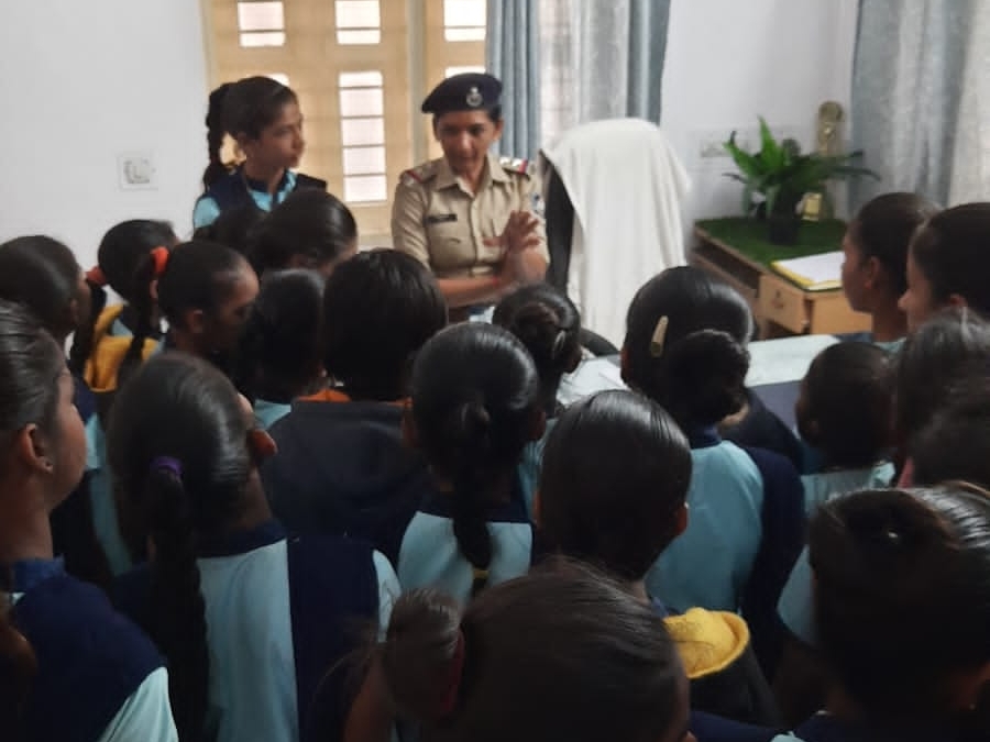 School students visit police station in Porbandar; Students were guided about police procedures ...