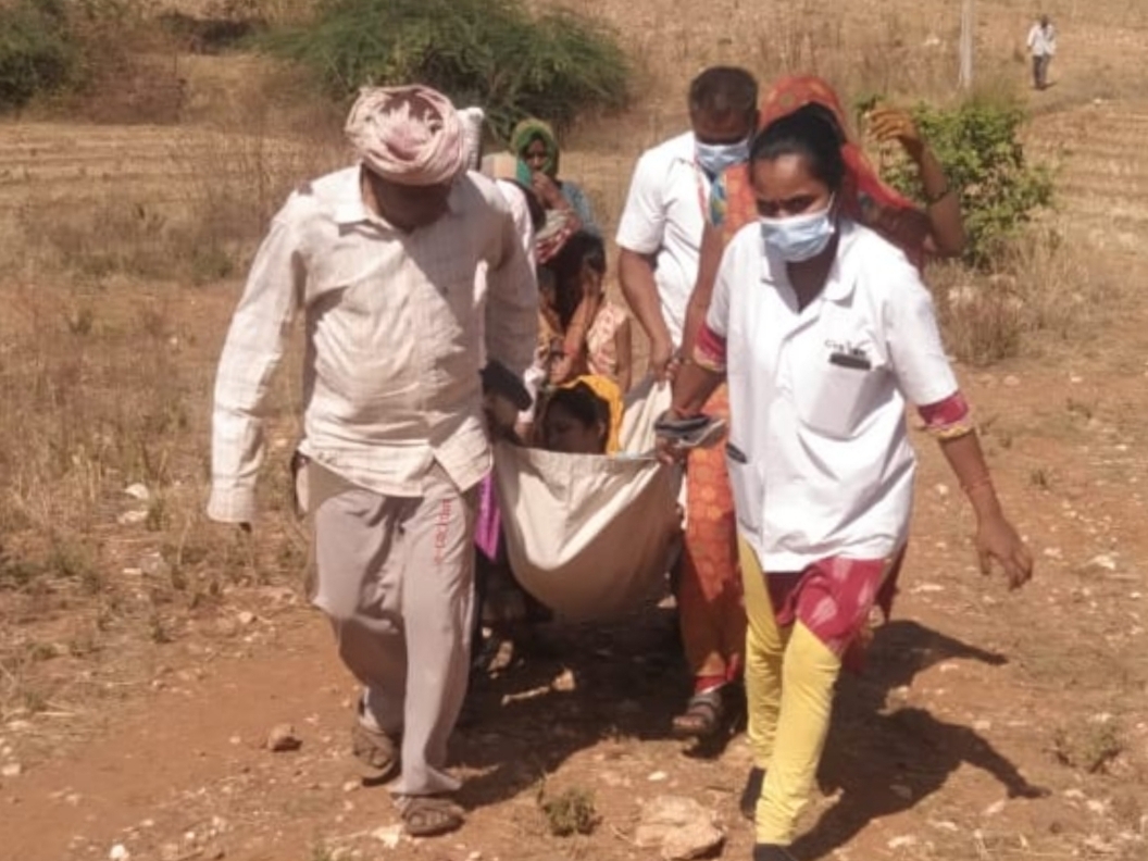 Due to lack of paved road in Big Panduli village of Meghraj, a pregnant ...