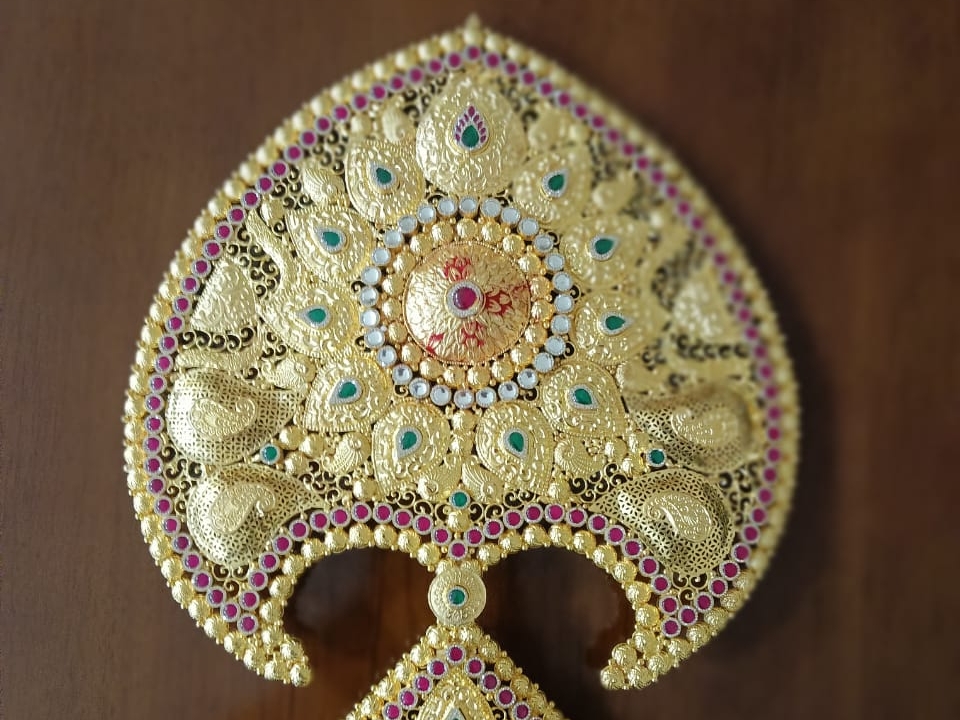 A golden crown was offered to Sriji by a devotee at the Dwarka Jagat ...