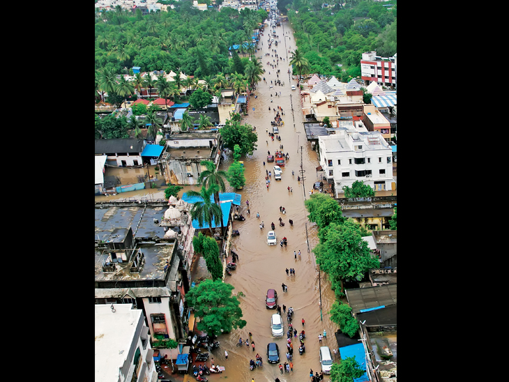 A flood of water; 13 inches in four hours at Navsari, 15 inches at ...