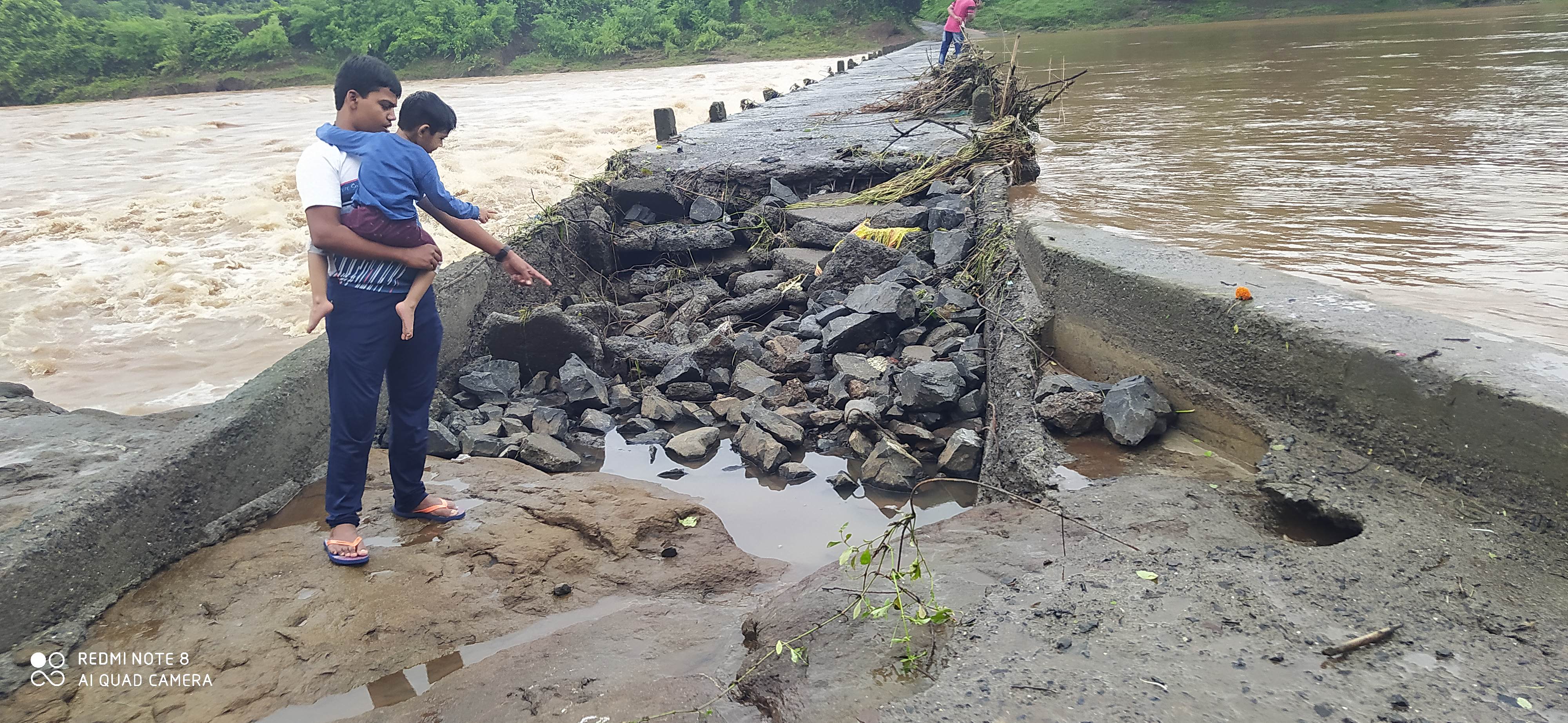 Erosion on both sides of Purna river causeway between Peladbuhari ...