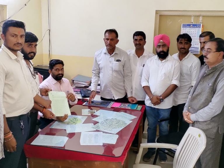 Demanding to construct the college complex at the approved site in ...