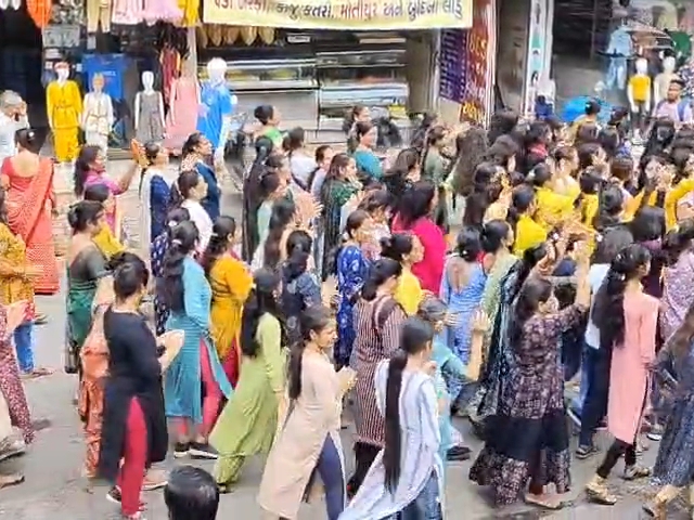 A procession was held in Navsari city, a large number of townspeople ...