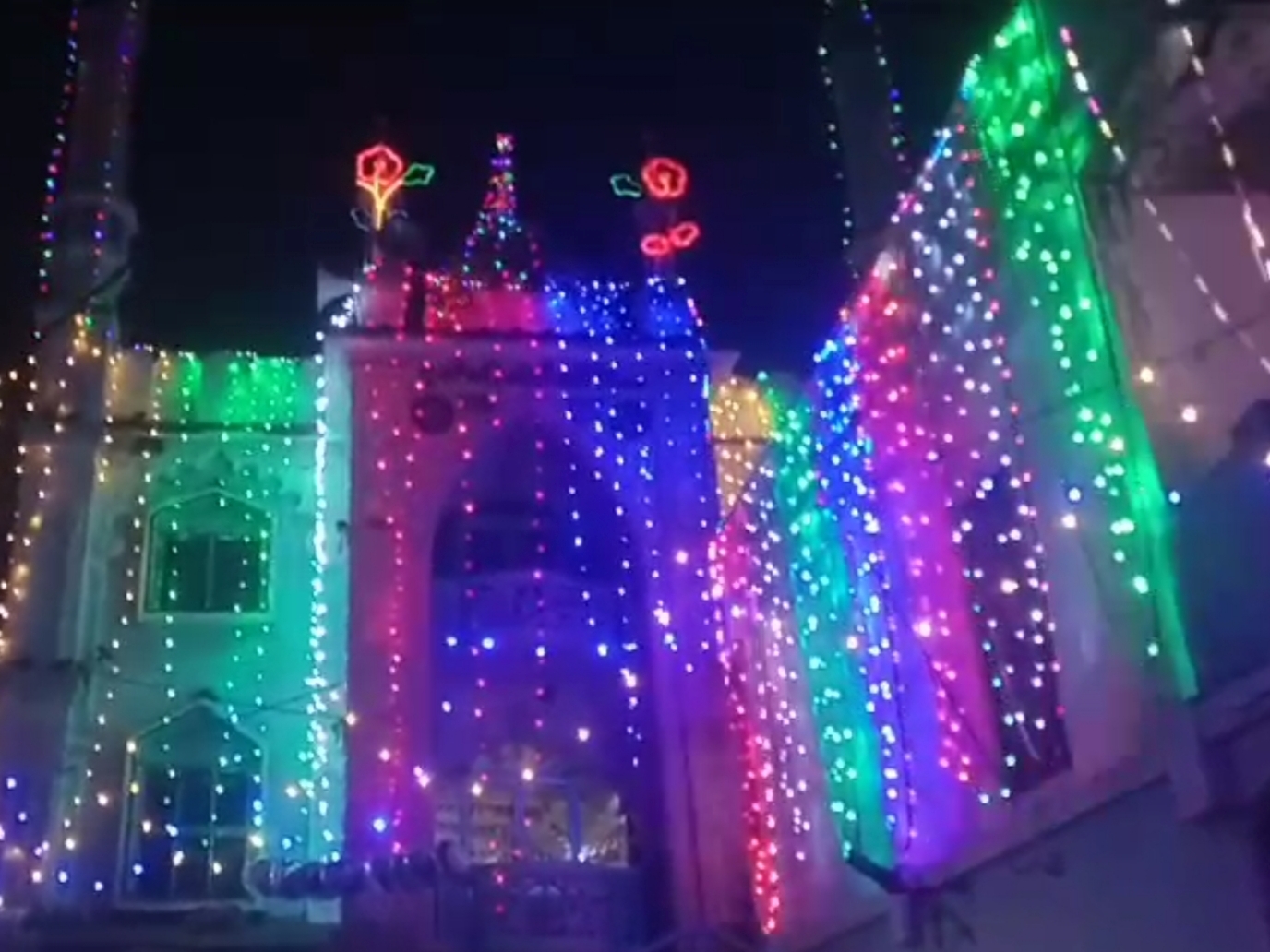 Mosques in different parts of the city were lit up with colorful lights ...
