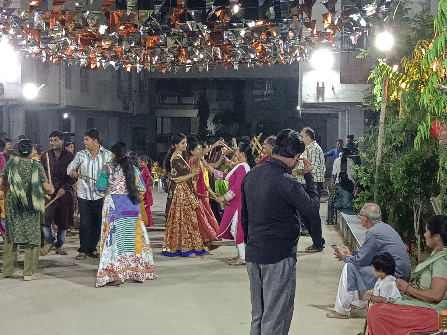 Aarti and Garbano were performed by the devotees in Gunatit Residency ...